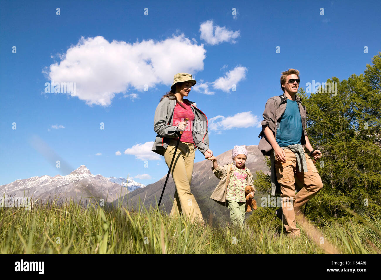 Happy family on a hiking trip Stock Photo - Alamy