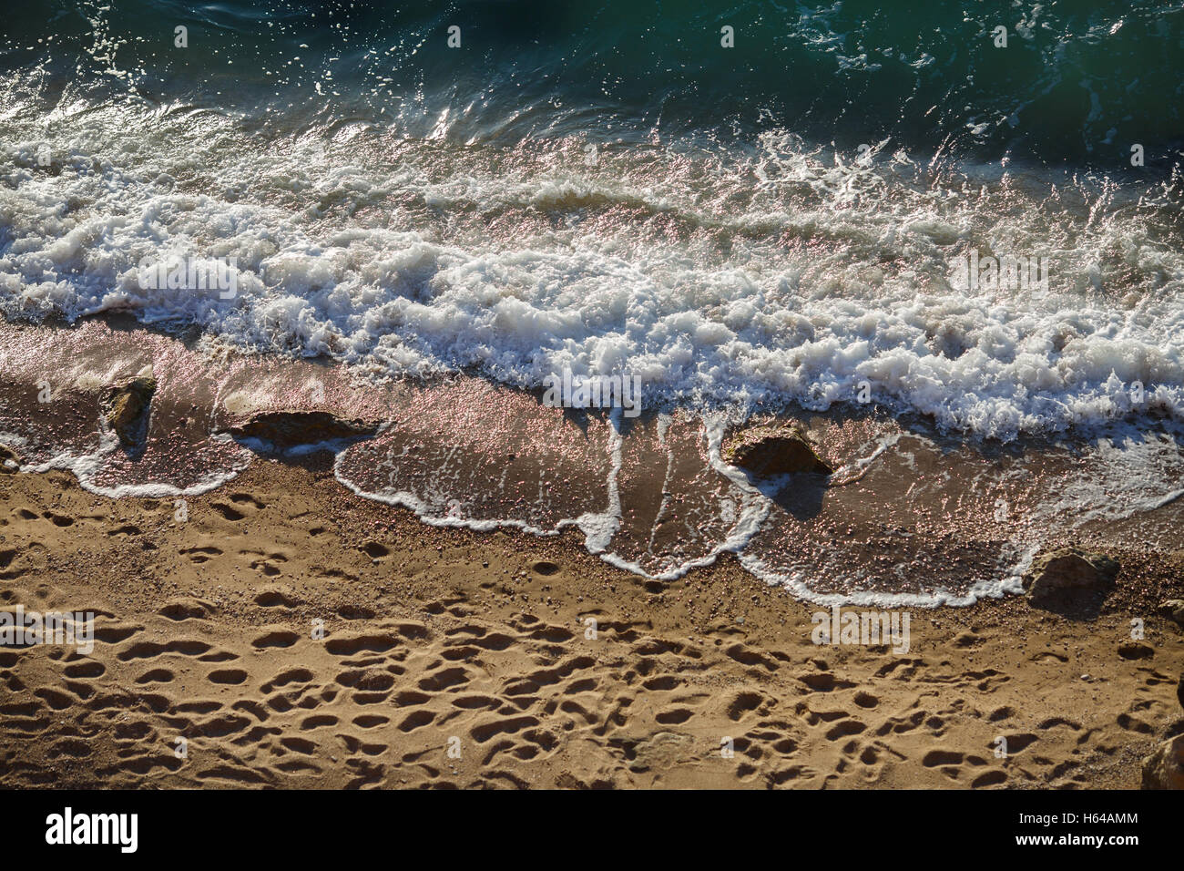 Sea lapping on pebble beach hi-res stock photography and images - Alamy