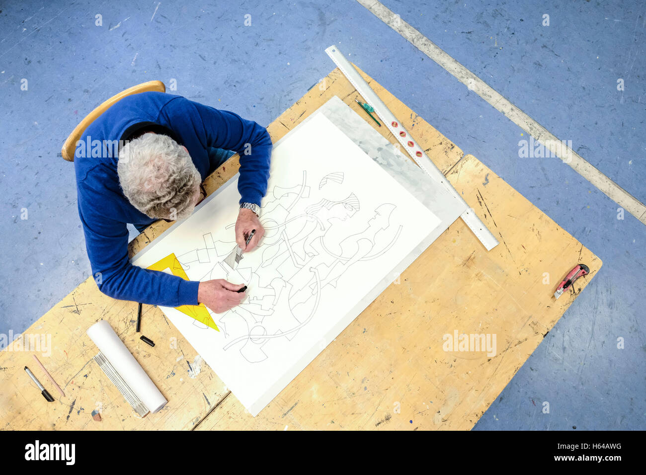 Top view of artist drawing in his studio Stock Photo - Alamy