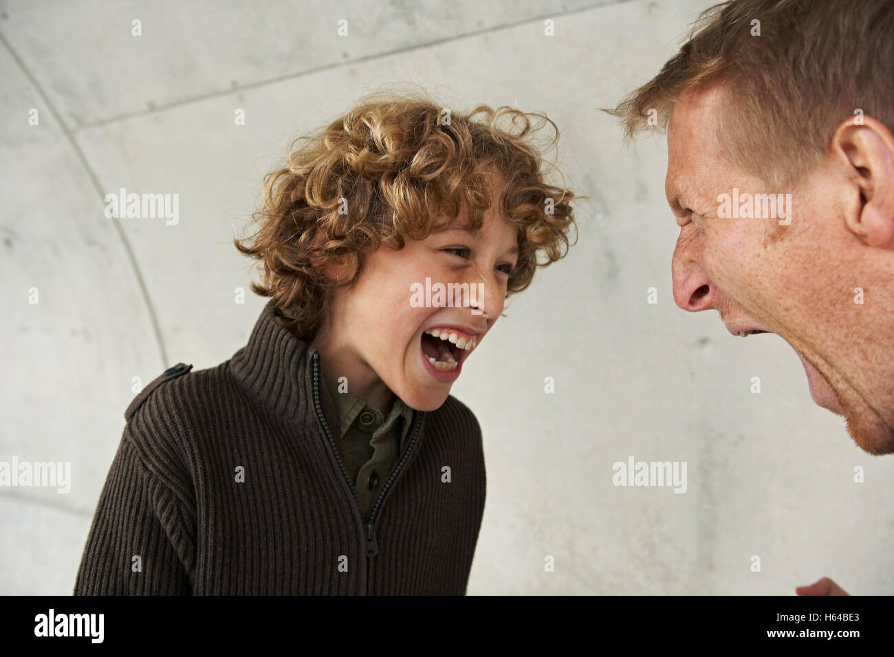 Father and son screaming at each other Stock Photo - Alamy