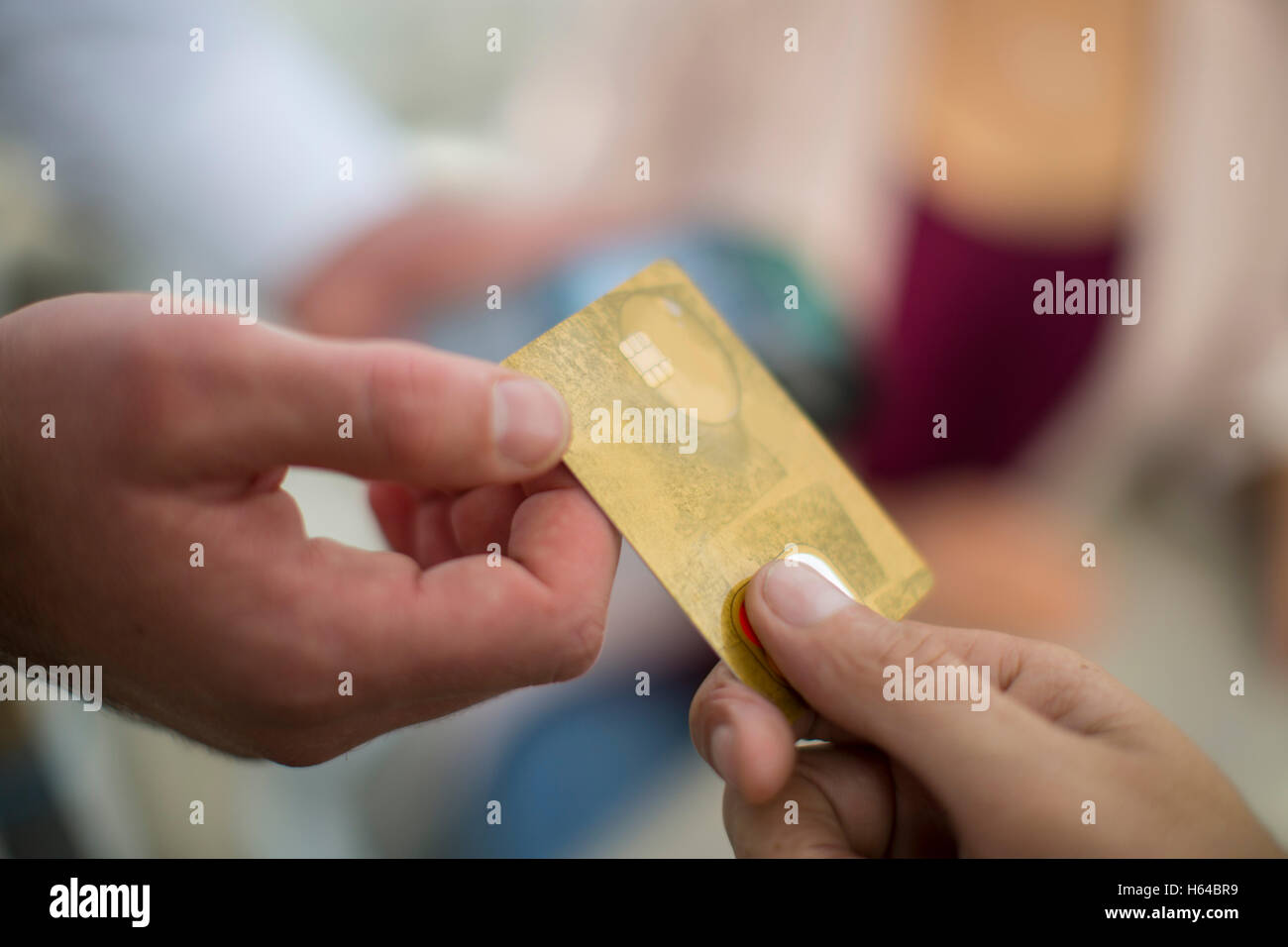 Paying with credit card Stock Photo - Alamy