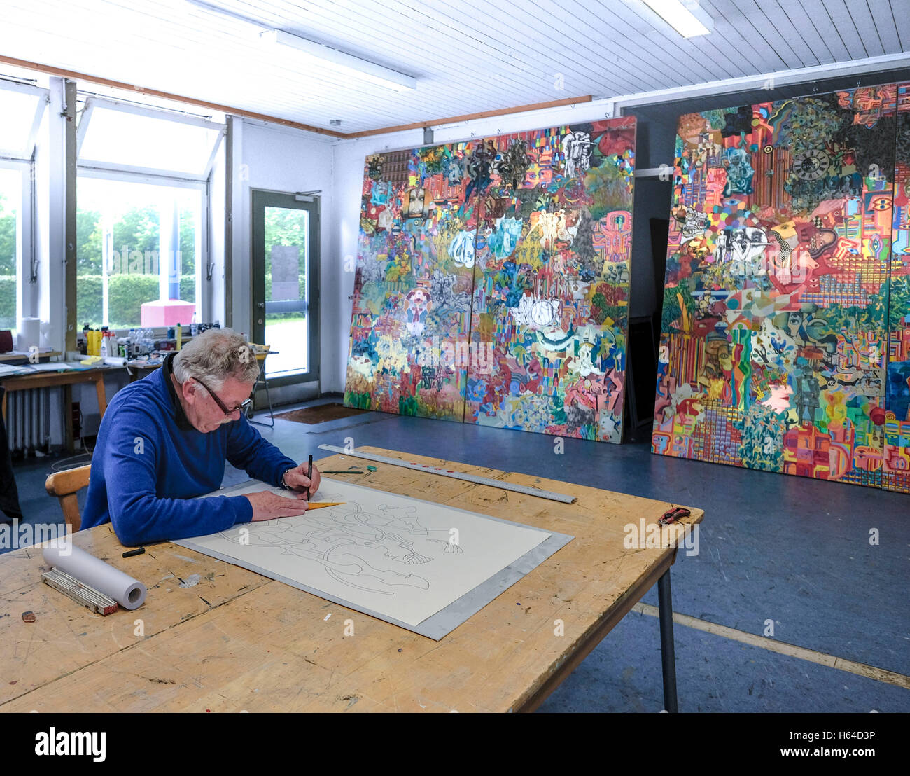 Artist drawing in his studio Stock Photo - Alamy