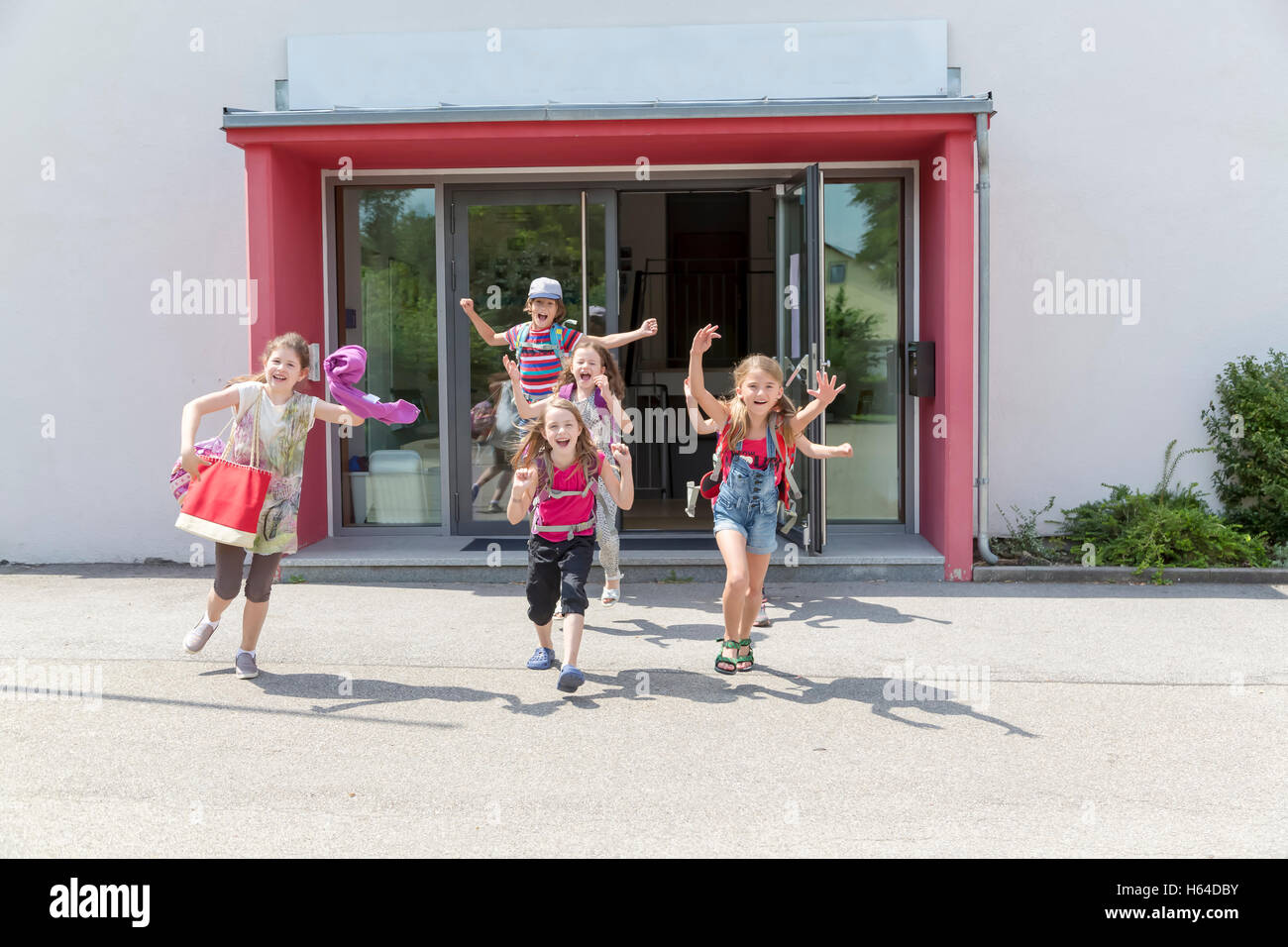 Girl leaving school building hi-res stock photography and images - Alamy