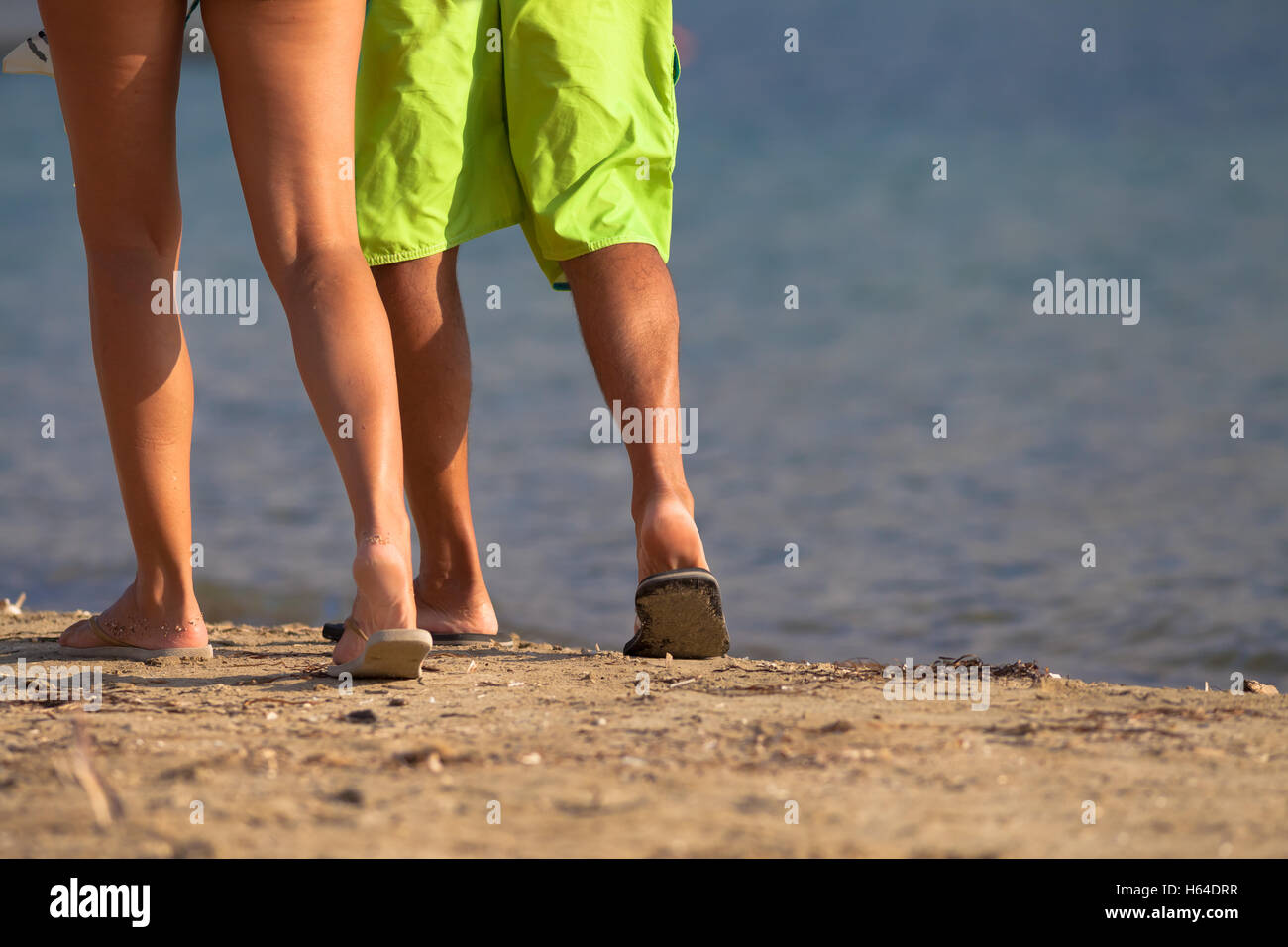 Legs walking on the beach Stock Photo - Alamy