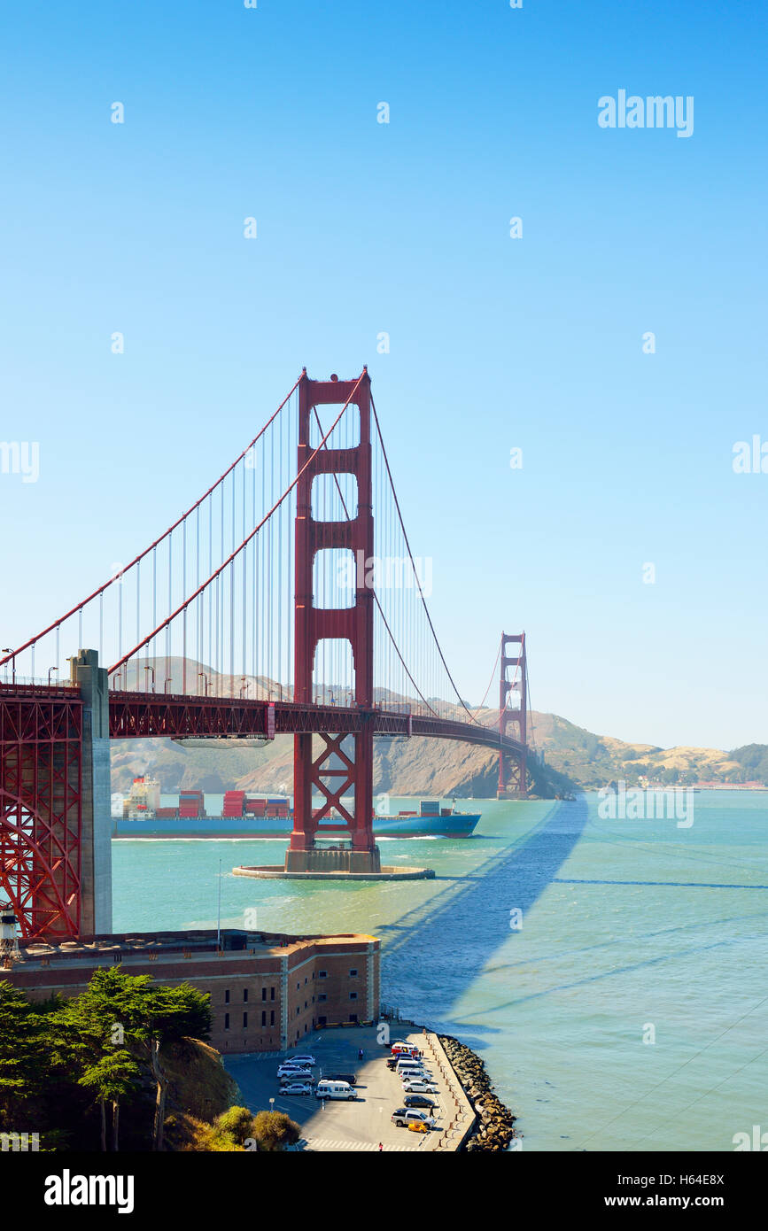 USA, California, San Francisco, container ship under Golden Gate Bridge ...