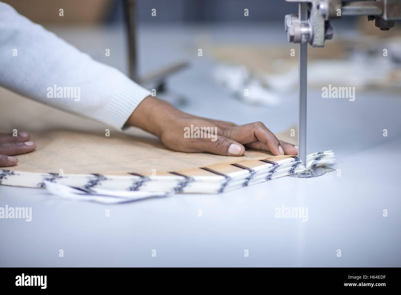 Cutting fabric hi-res stock photography and images - Alamy