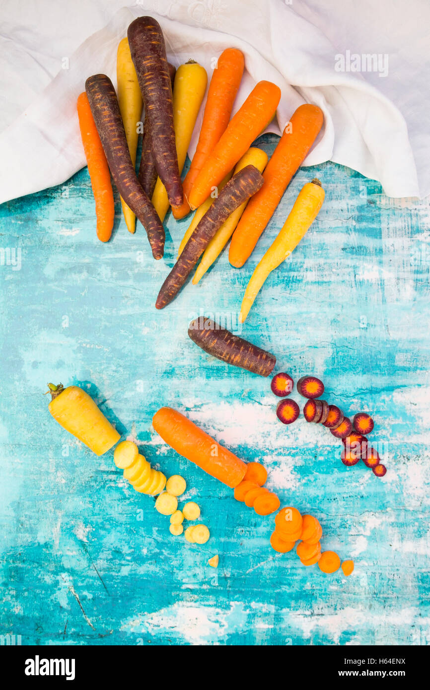 Different sorts of whole and sliced carrots Stock Photo - Alamy