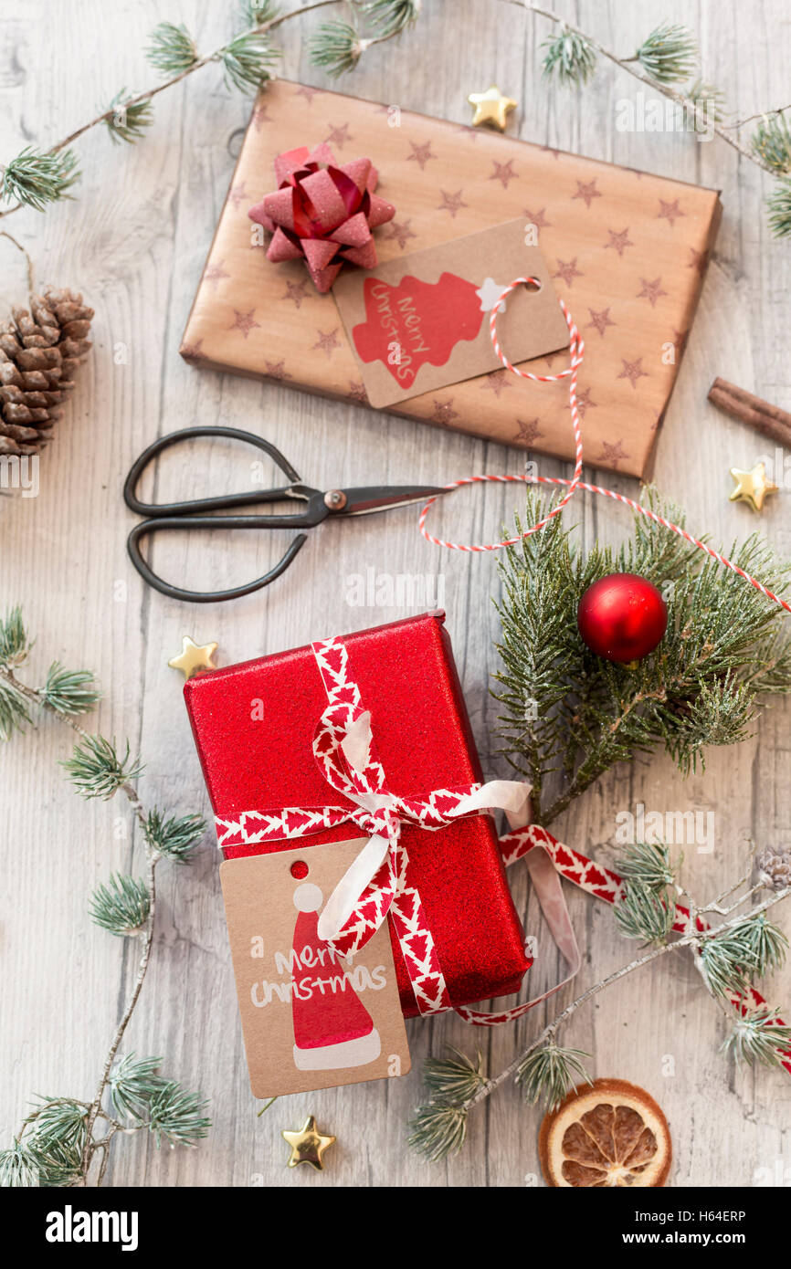 Wrapped parcel and scissors hi-res stock photography and images - Alamy