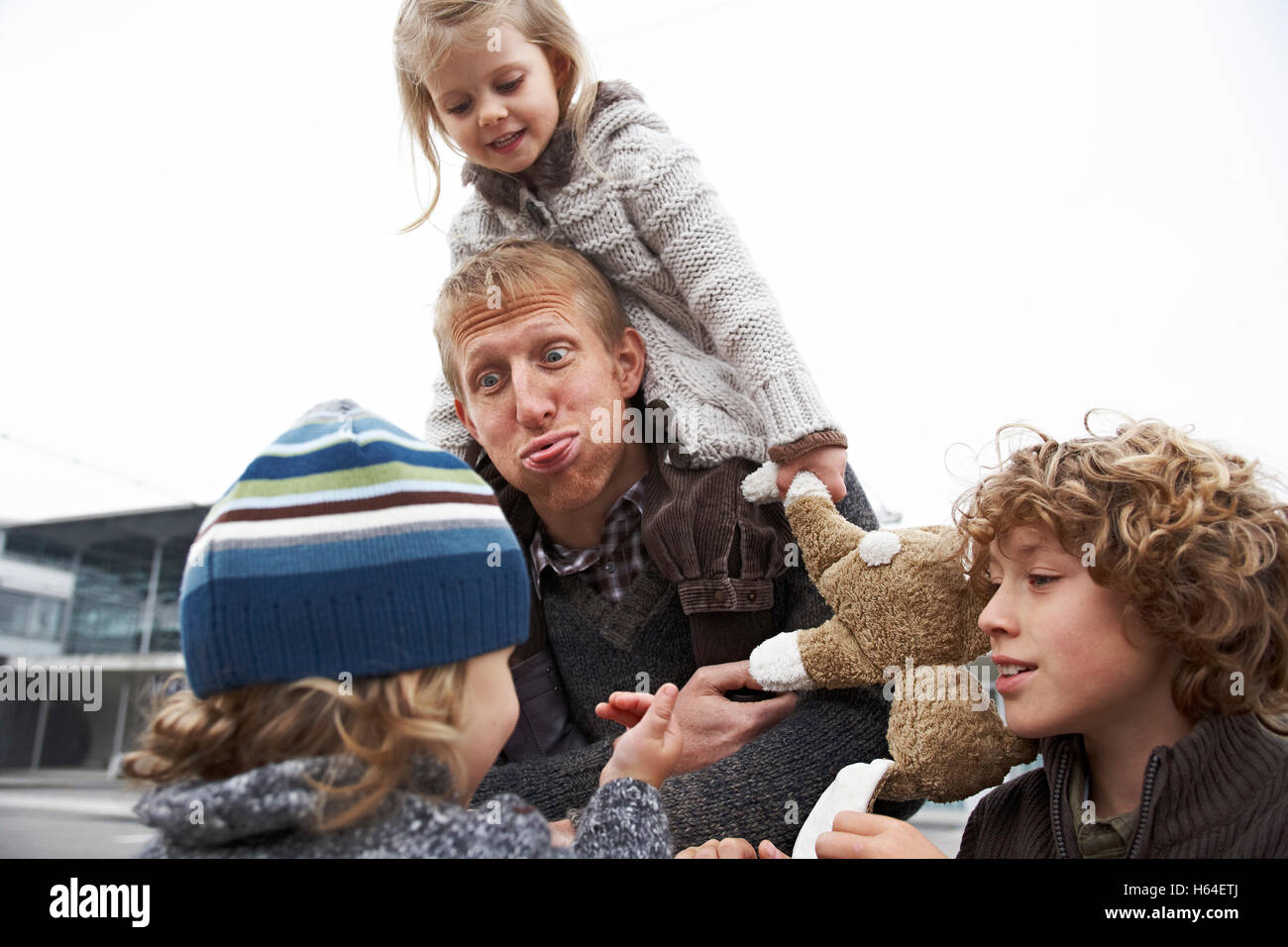 Father going out with his children Stock Photo - Alamy
