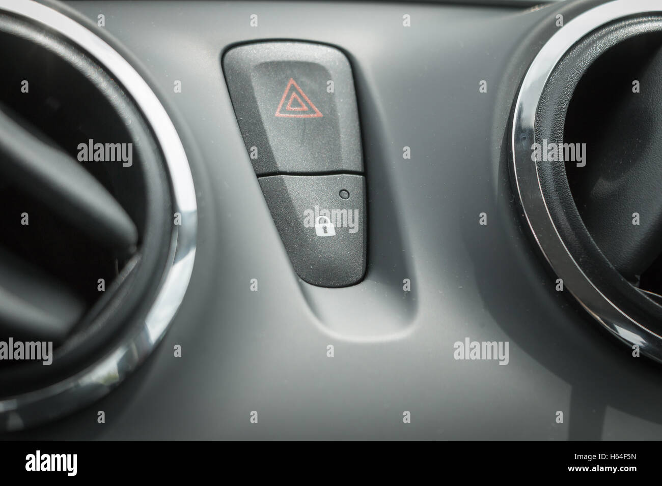 central locking switch and warning light on a car dashboard Stock Photo ...