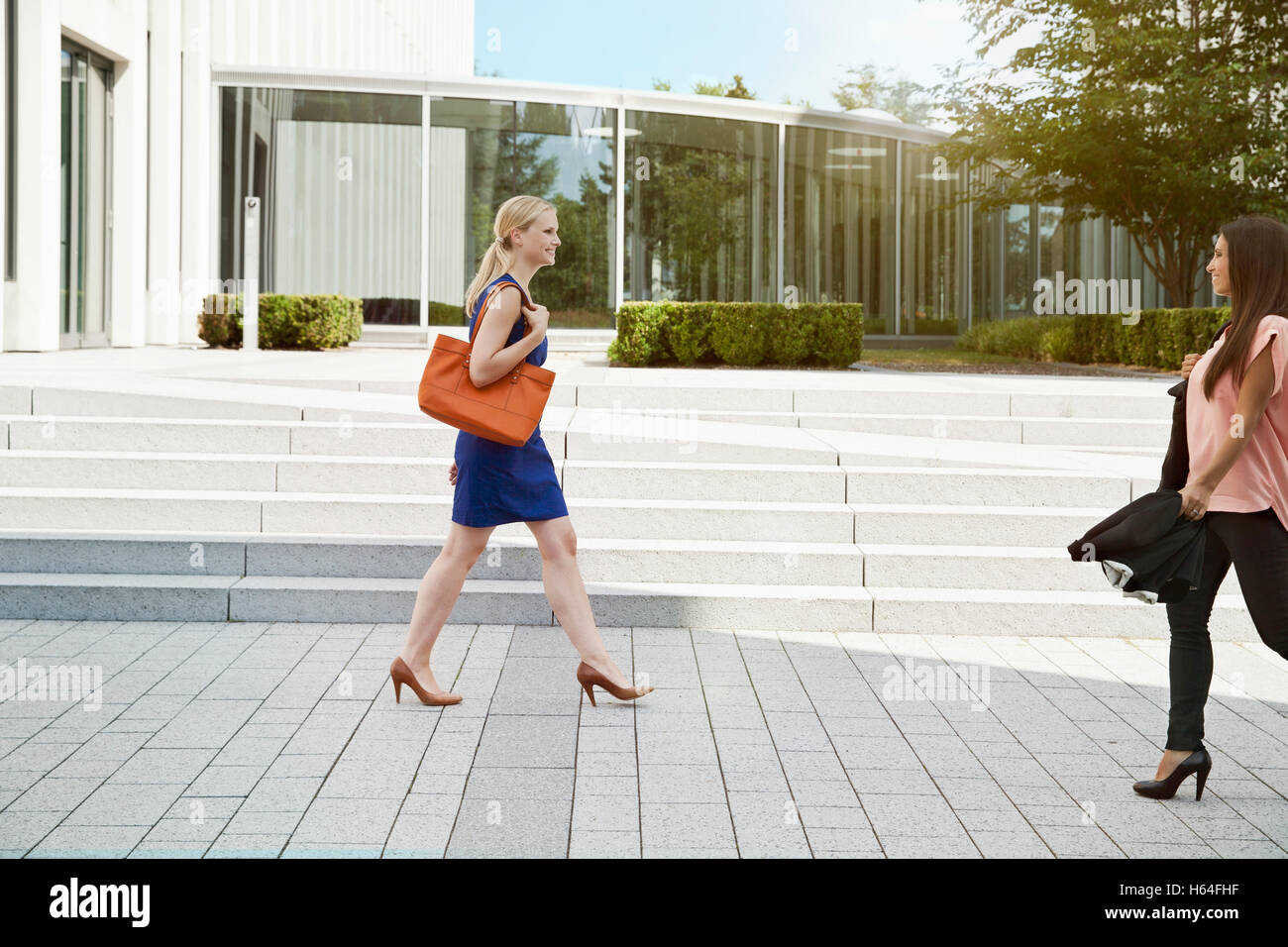 Women walking in high heels hi-res stock photography and images - Alamy
