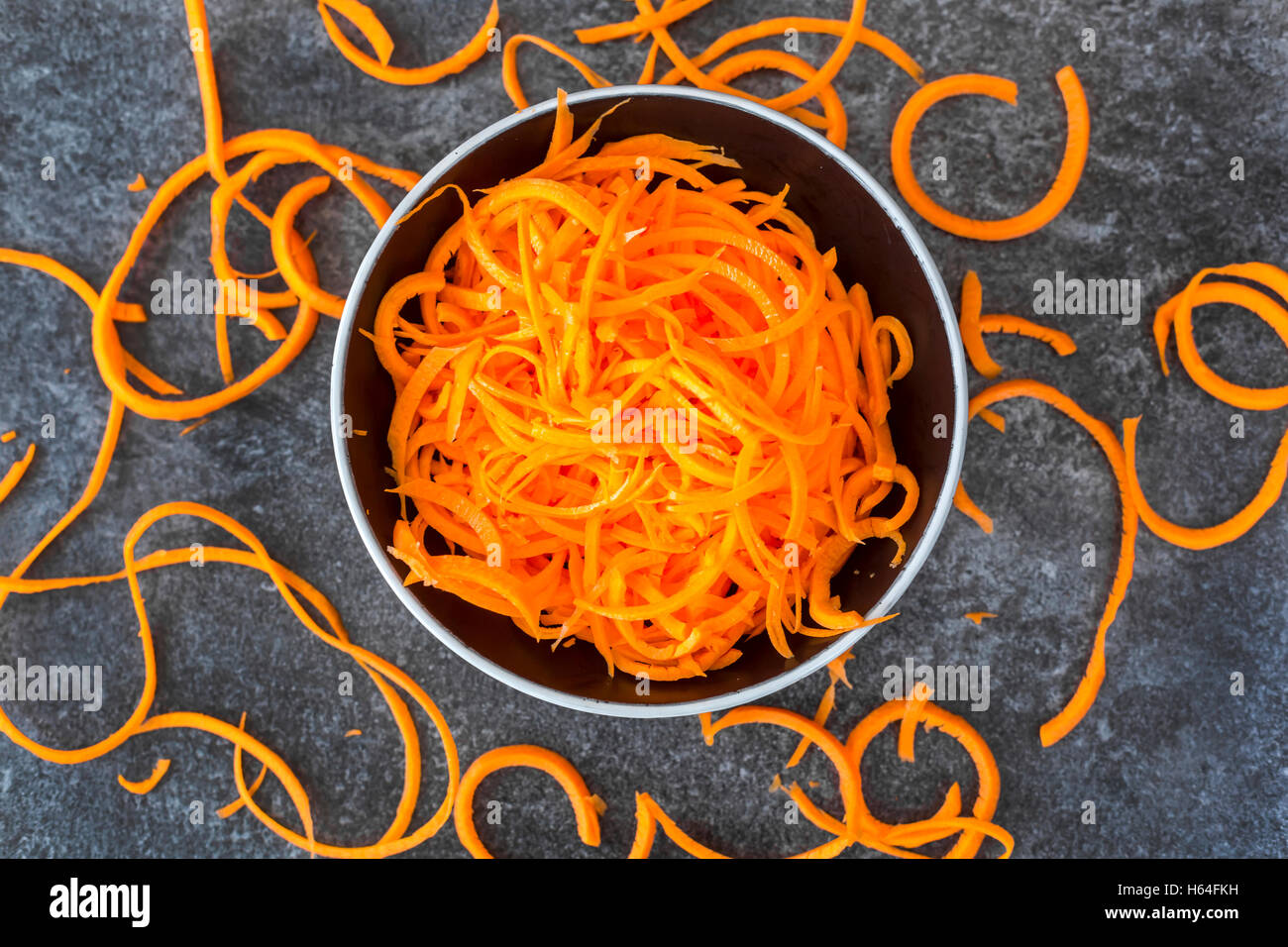 Bowl of carrot spaghetti Stock Photo - Alamy