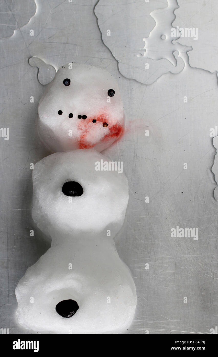 Melting snowman with blood on his mouth Stock Photo - Alamy