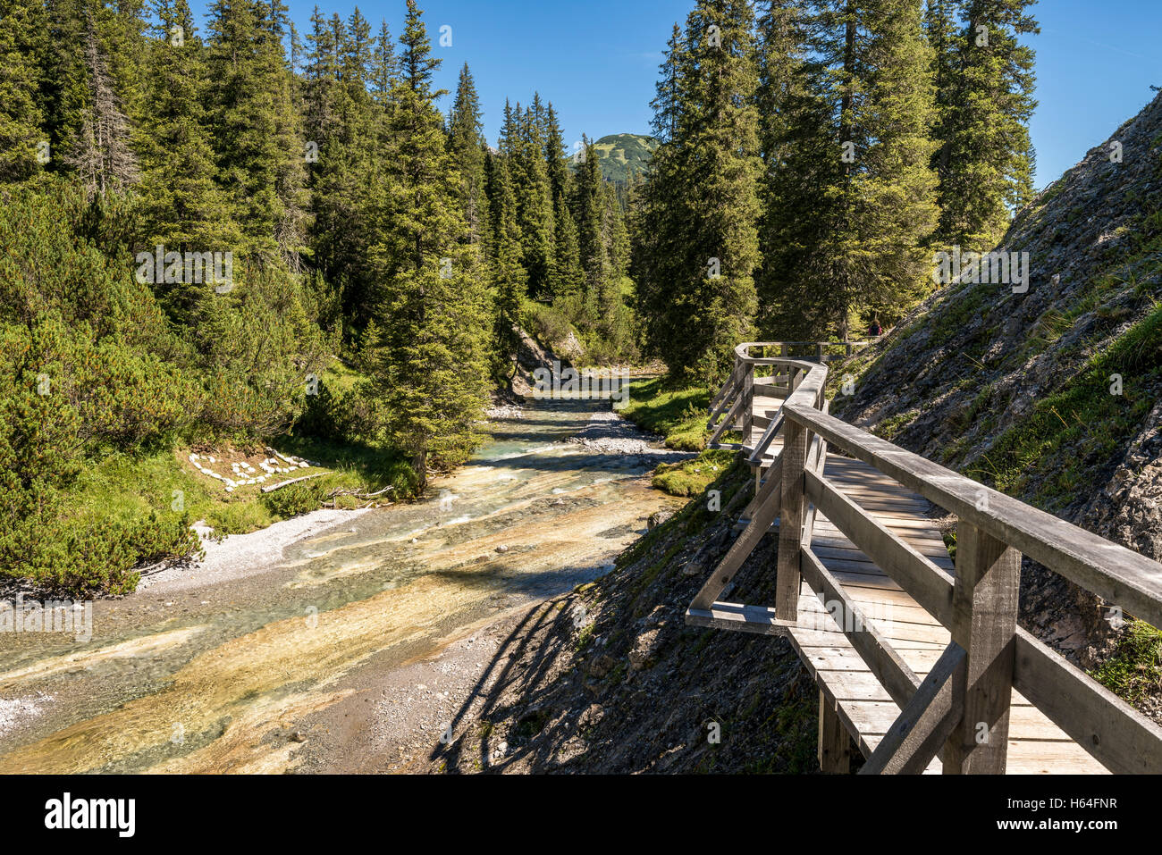 Austria, Vorarlberg, Lech Valley, Lech river and wooden boardwalk Stock ...