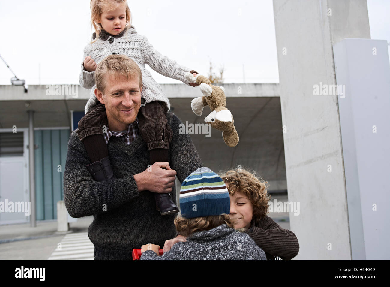 Father going out with his children Stock Photo - Alamy
