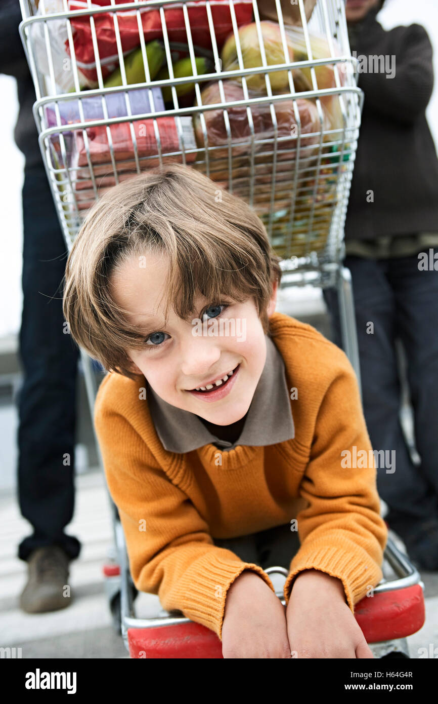 Boy goes shopping with his family Stock Photo - Alamy