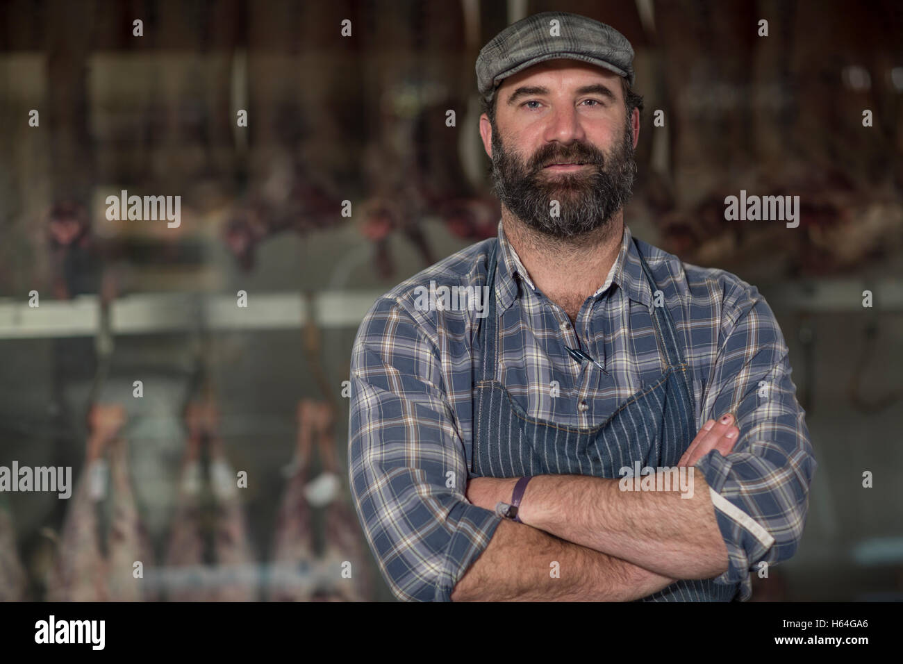 Portrait of confident butcher in butchery Stock Photo - Alamy