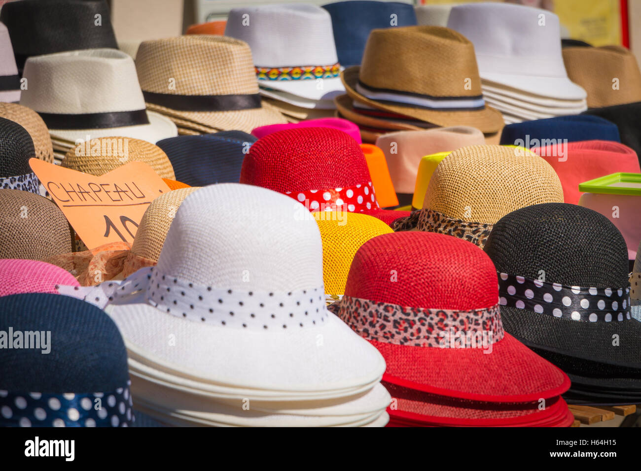 hat stack on a market show Stock Photo - Alamy