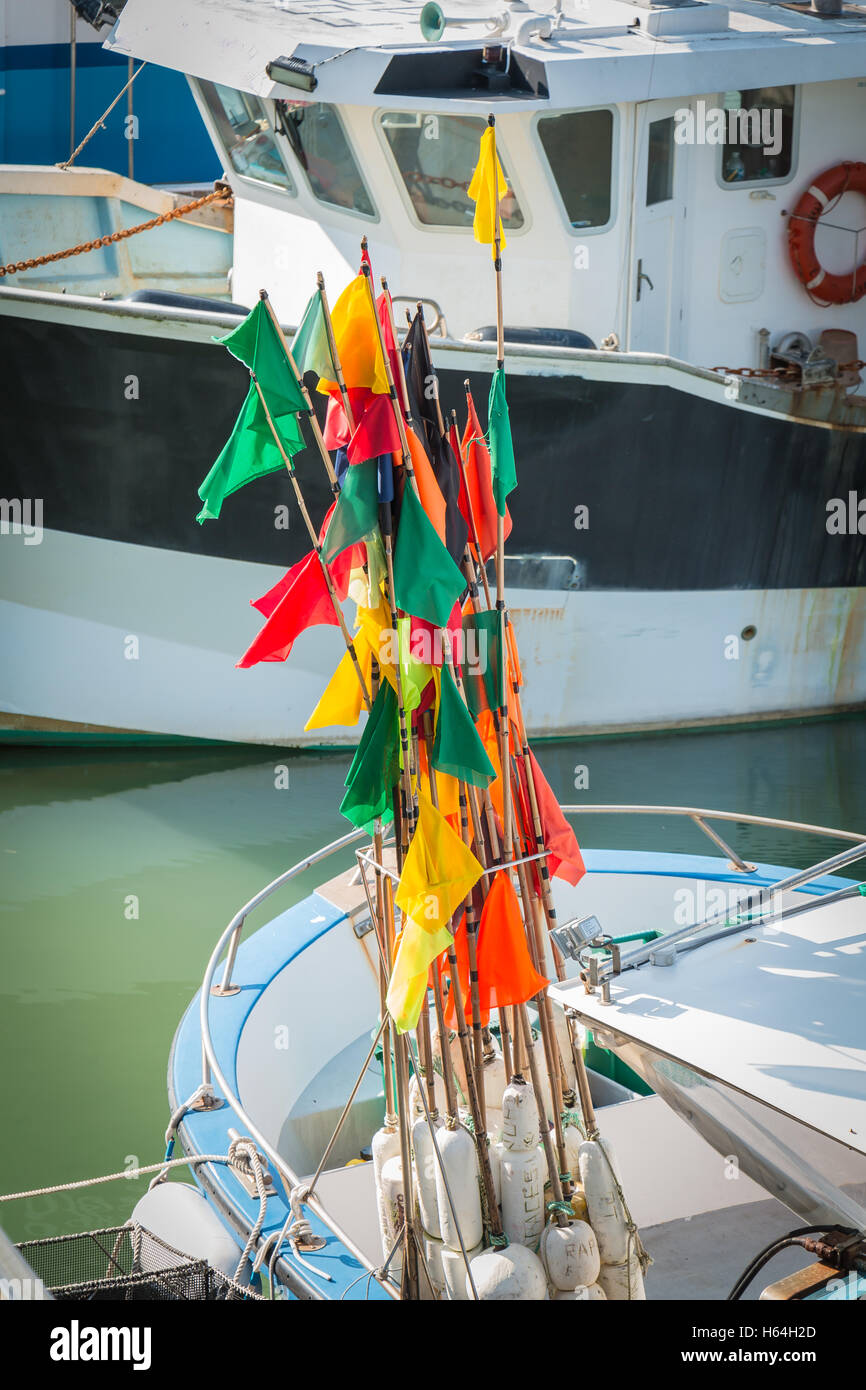 bunch of flags with fishing float after sea fishing back Stock Photo ...
