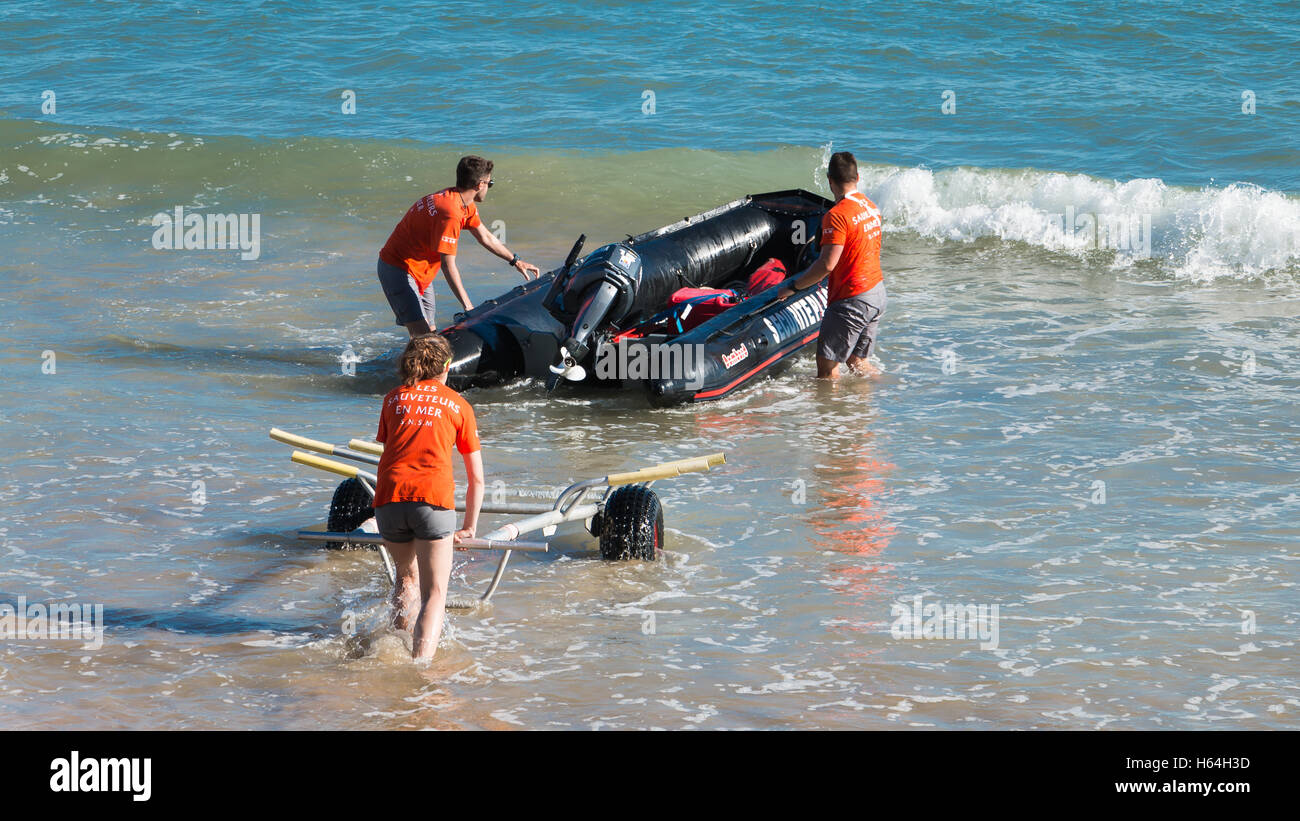 Sables-d-Olonnes, France - July 05, 2016 : french bay lifeguards (S.N.S ...