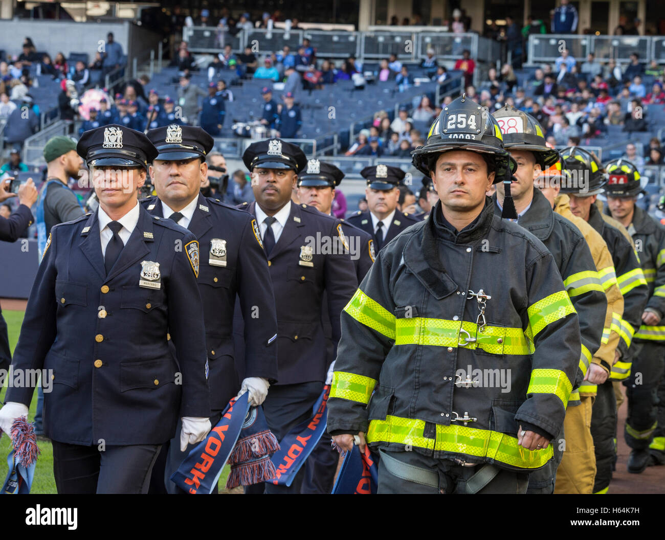 New York, United States. 23rd Oct, 2016. Members of NYPD and FDNY enter ...