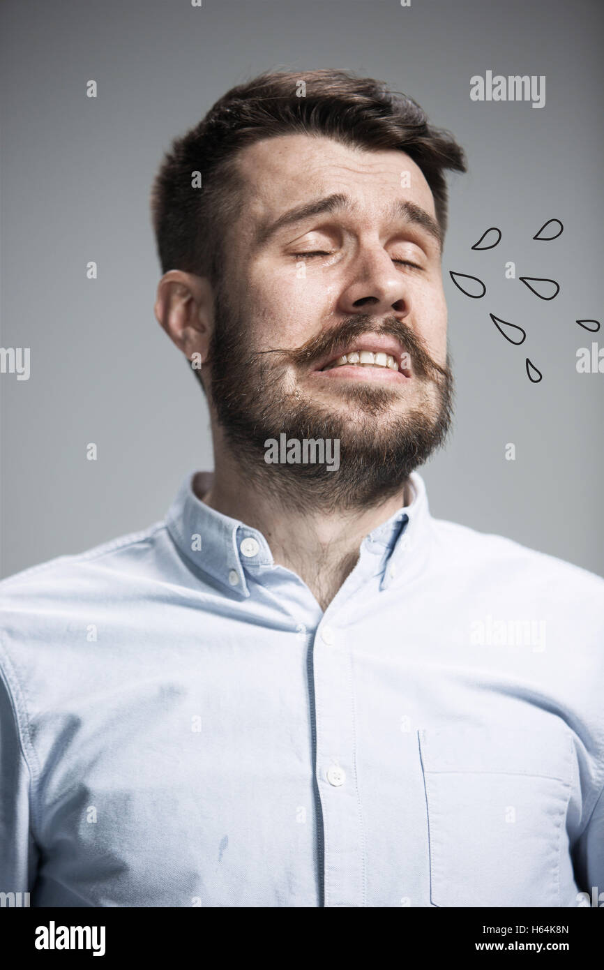 The crying man with tears on face closeup Stock Photo - Alamy