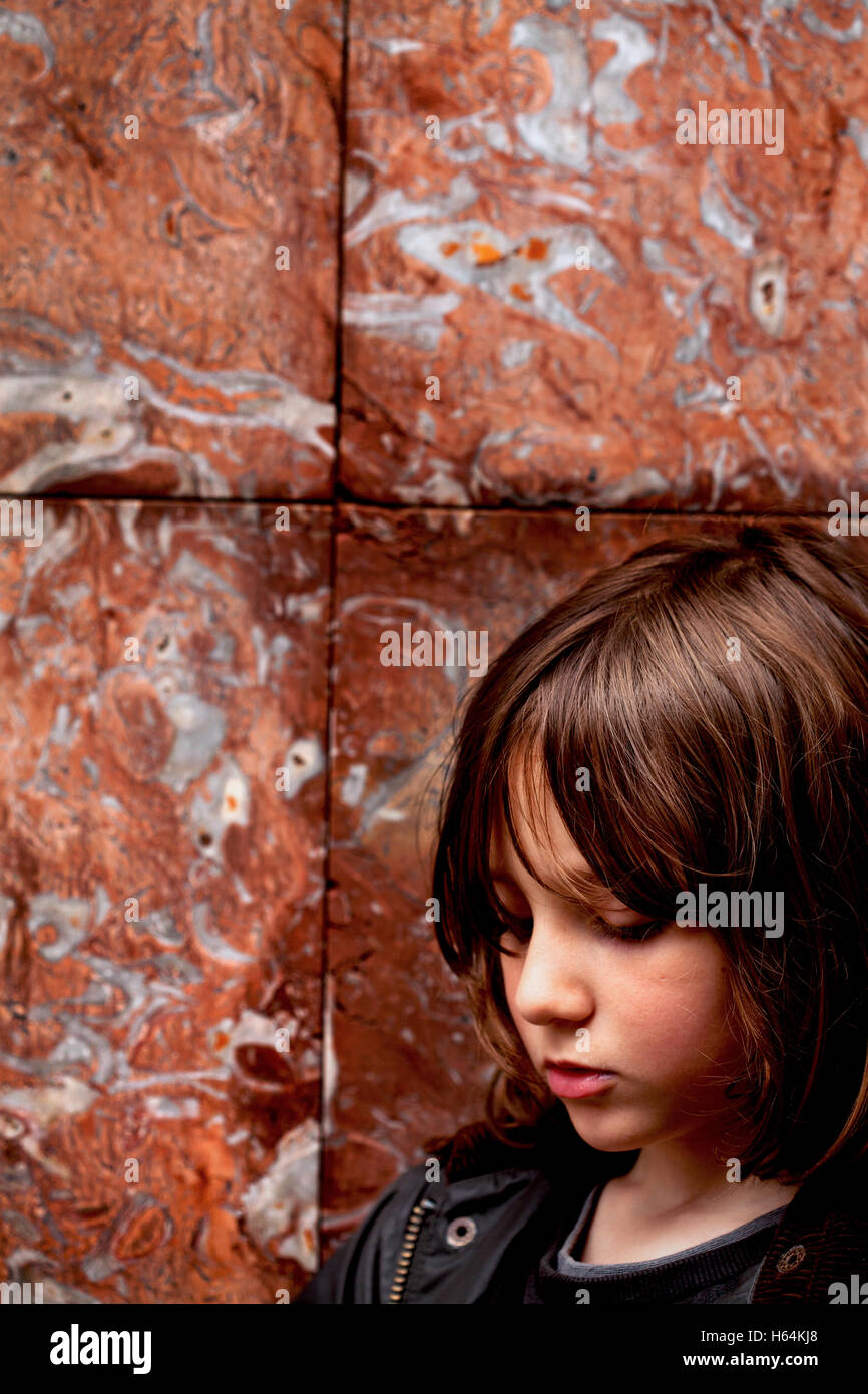 Very good looking boy looking moody Stock Photo - Alamy