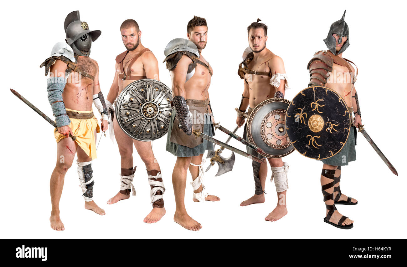 Group of gladiators posing isolated in white Stock Photo - Alamy