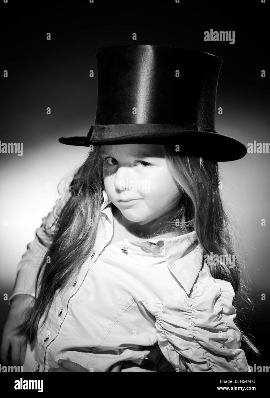 Cute little girl posing in gibus, old-style opera hat, vintage photo ...