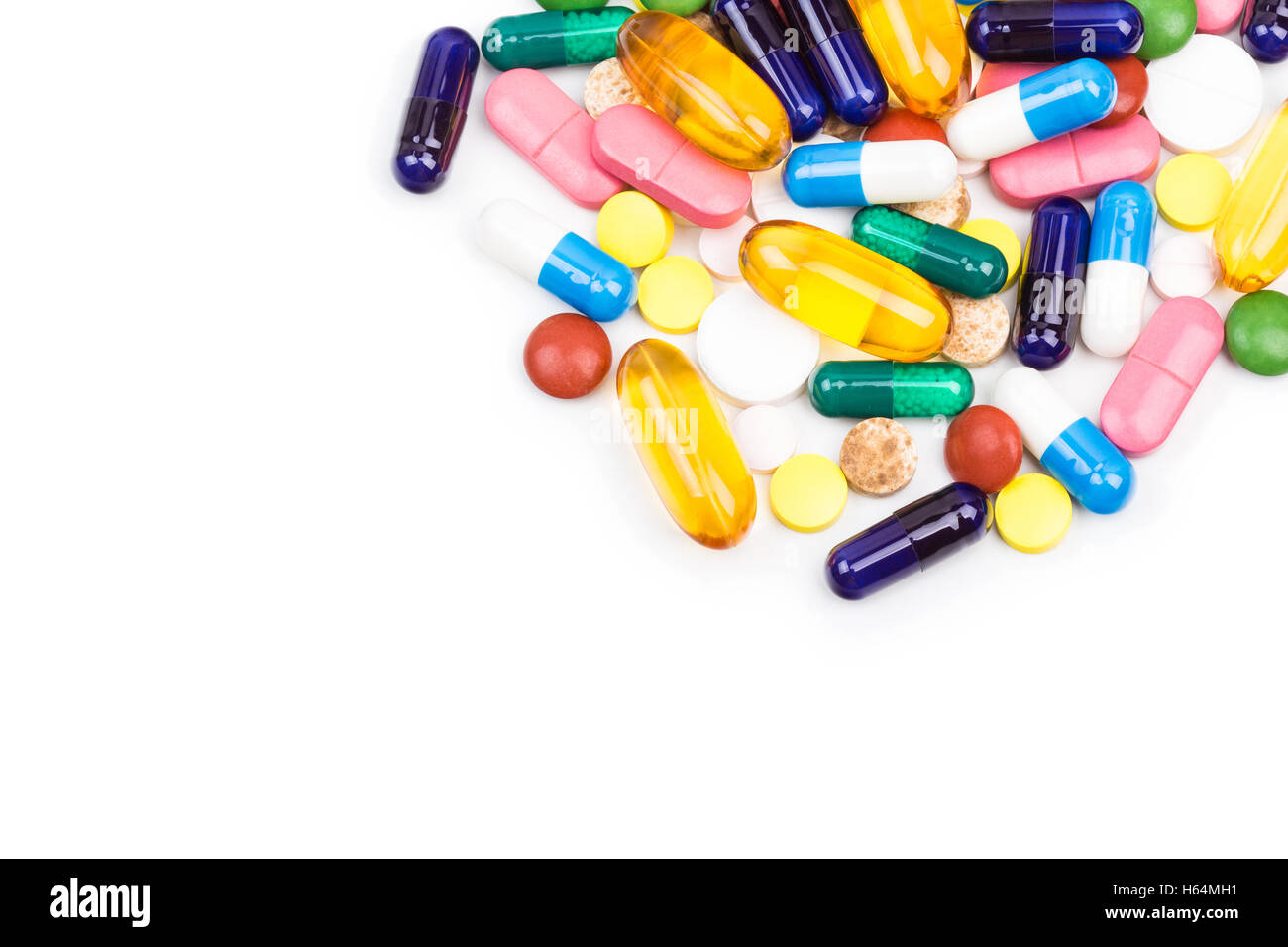 Various color pills and capsules close shot on white Stock Photo - Alamy