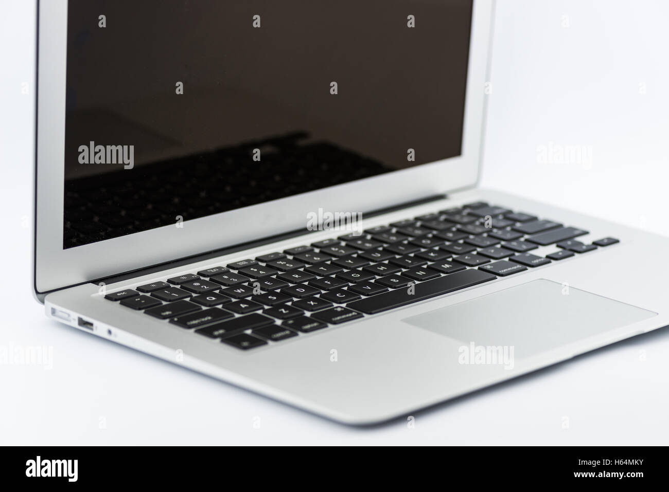 Laptop isolated on white background Stock Photo - Alamy