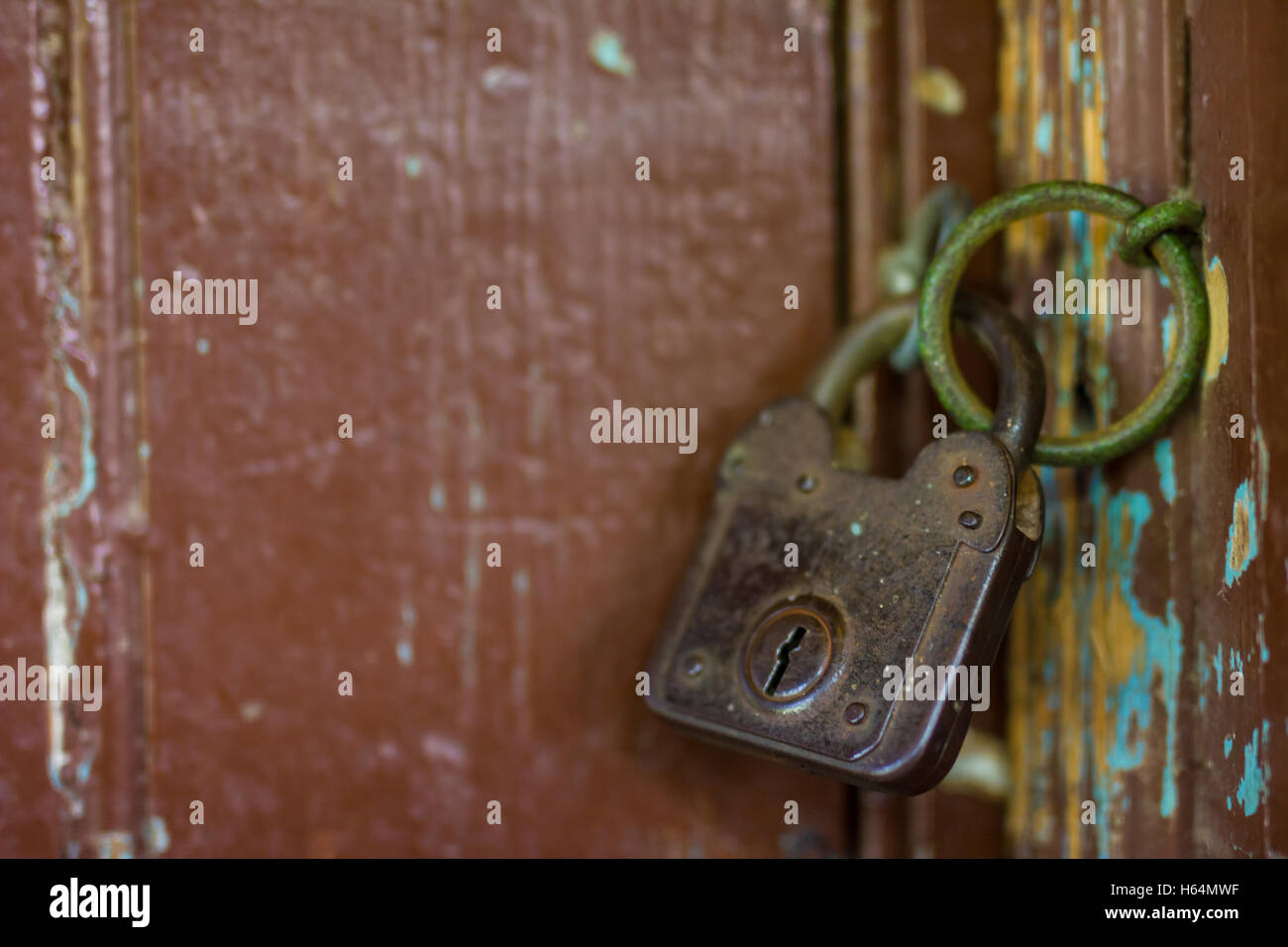 Old rusty lock on the wooden gate Stock Photo - Alamy