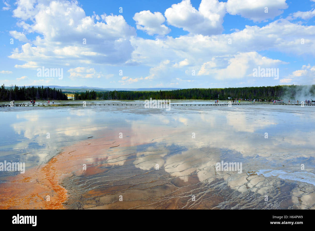 Midway Geyser Basin and reflection of clouds in Yellowstone National ...