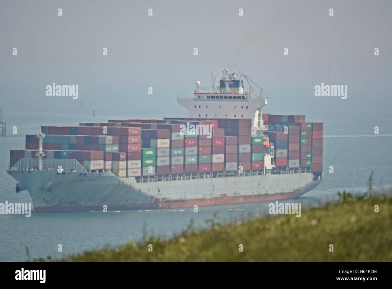 A cargo ship sailing into the Boston Seaport Cargo Terminal in South ...