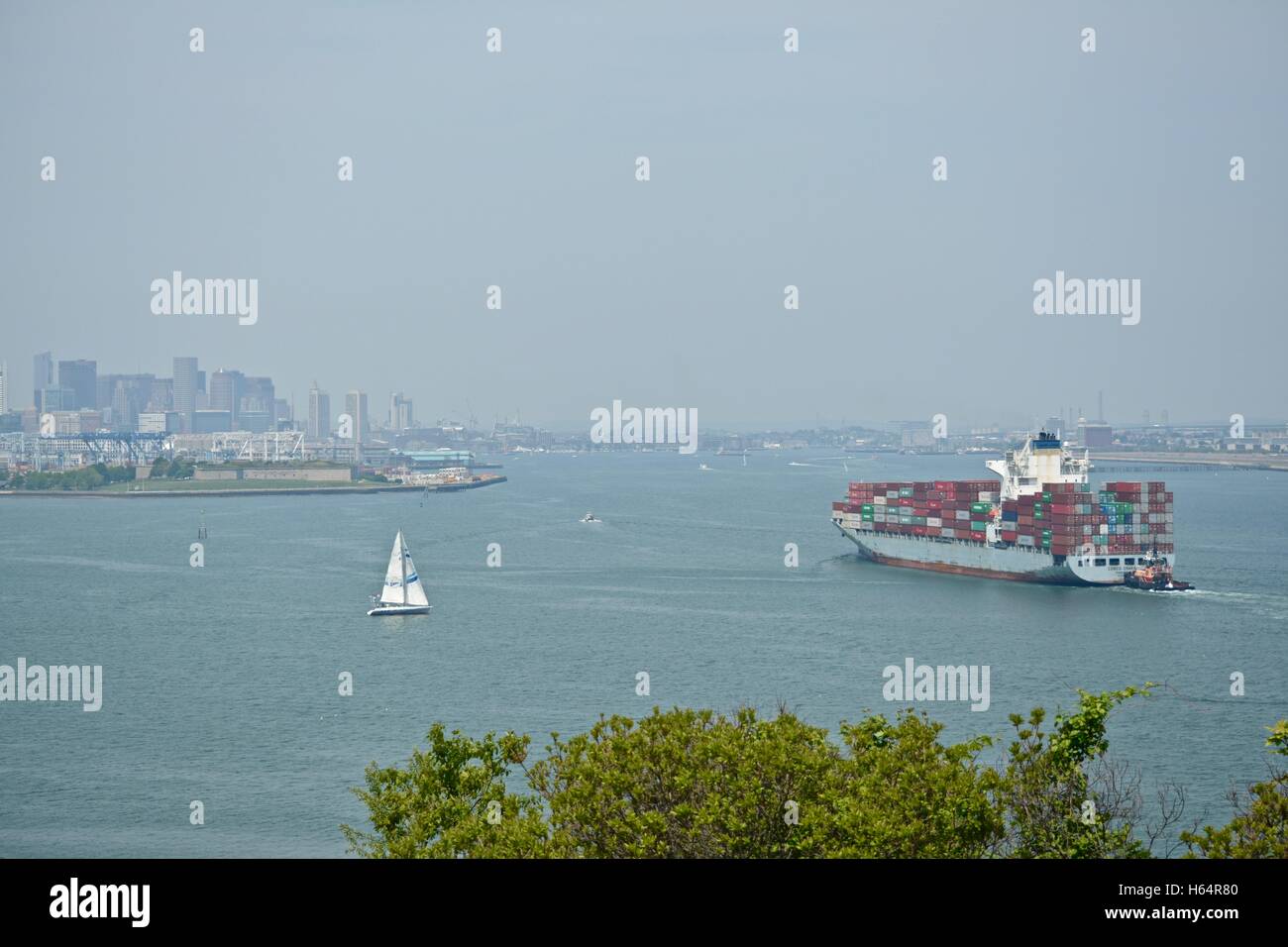 A cargo ship sailing into the Boston Seaport Cargo Terminal in South ...
