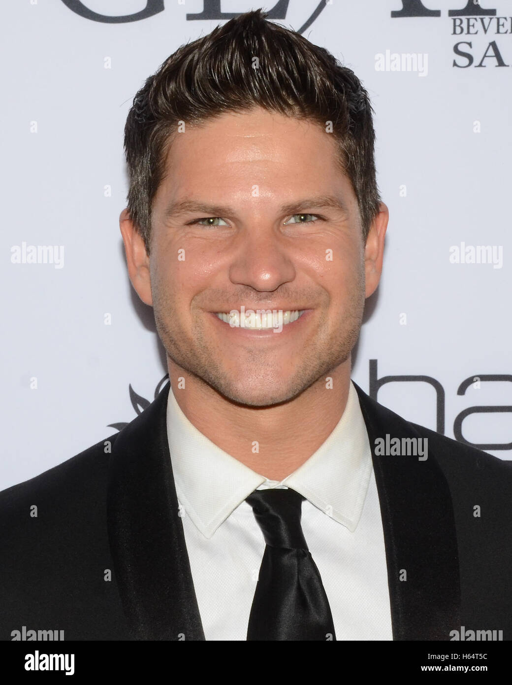 Daniel Booko arrives at the GLAM Beverly Hills Salon Grand Opening ...