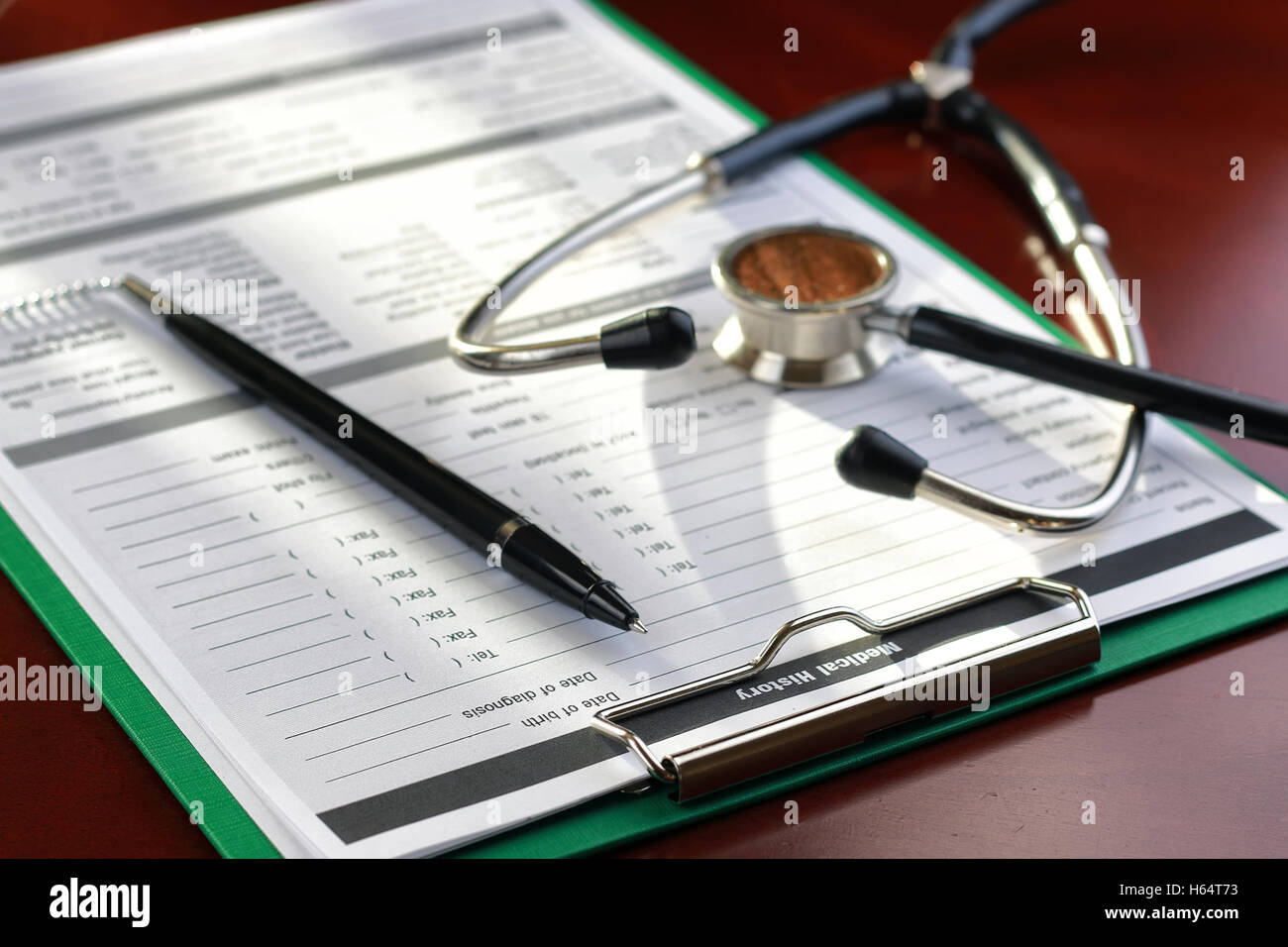 stethoscope medical documents pen Stock Photo - Alamy