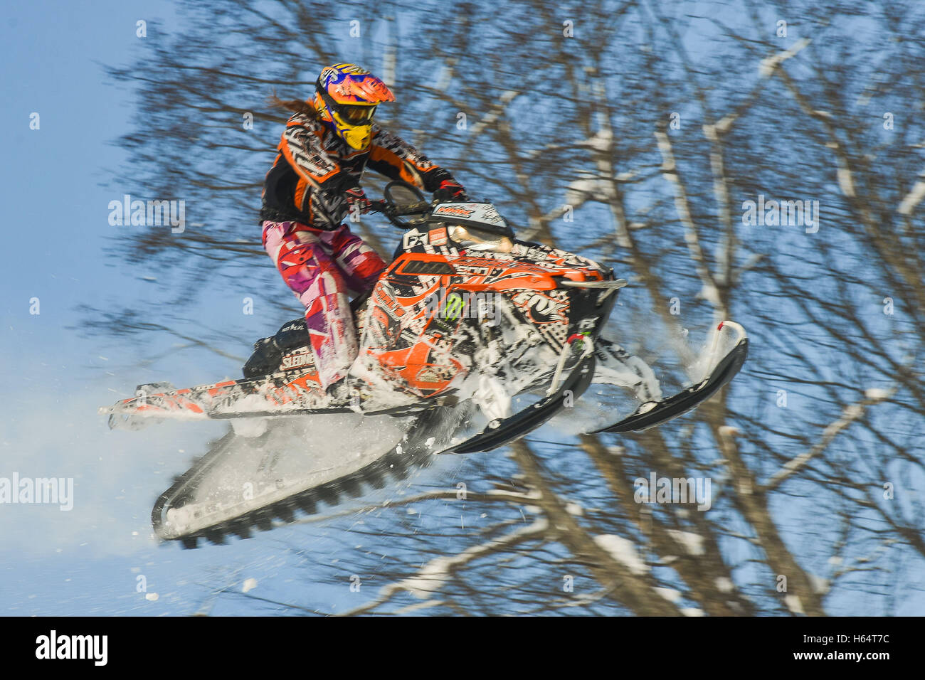 Snowmobile Jumping Extreme Snowmobiling High Resolution Stock ...