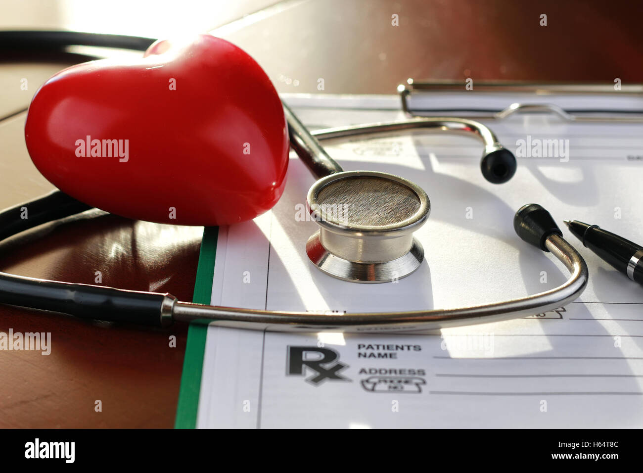 stethoscope medical documents pen Stock Photo - Alamy