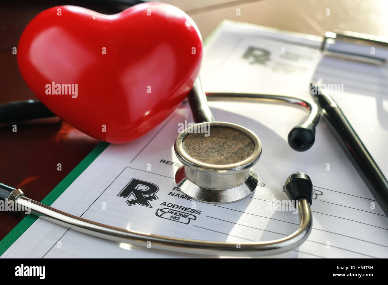 stethoscope medical documents pen Stock Photo - Alamy