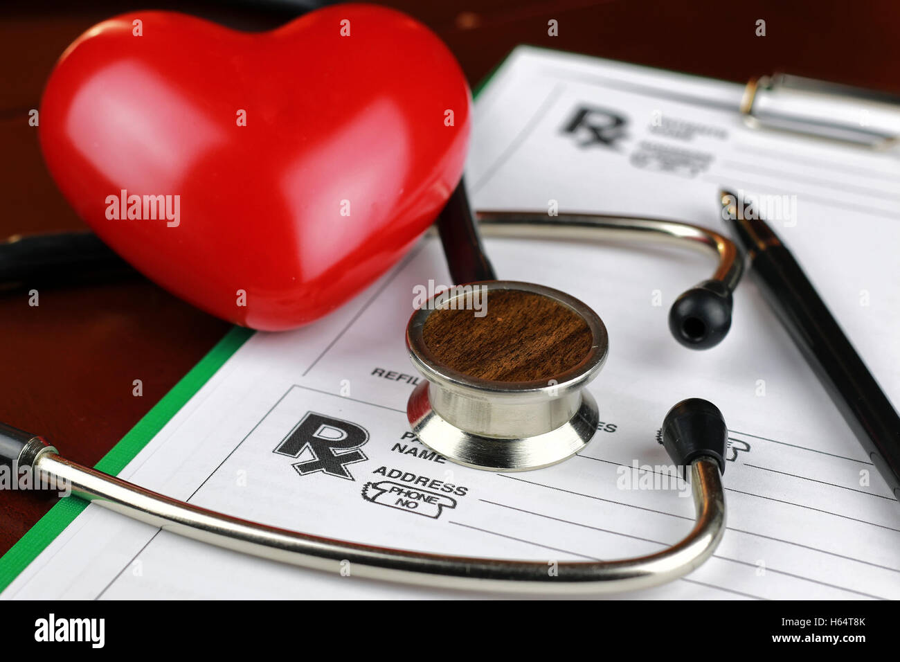 stethoscope medical documents pen Stock Photo - Alamy