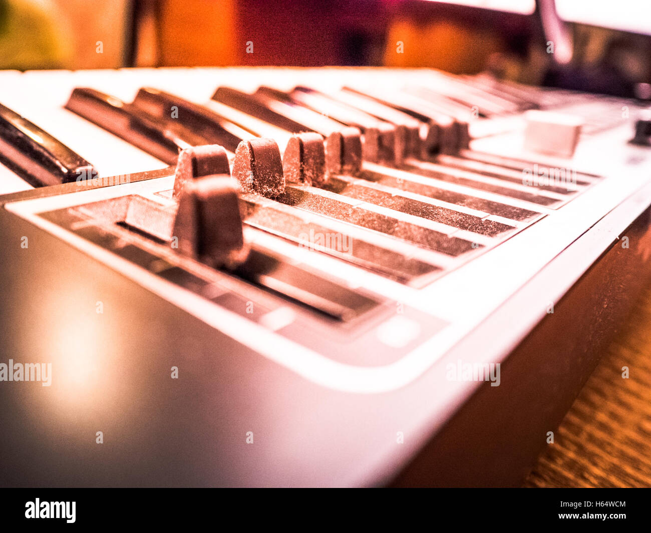 Keyboard of a synthesizer with sliders Stock Photo - Alamy