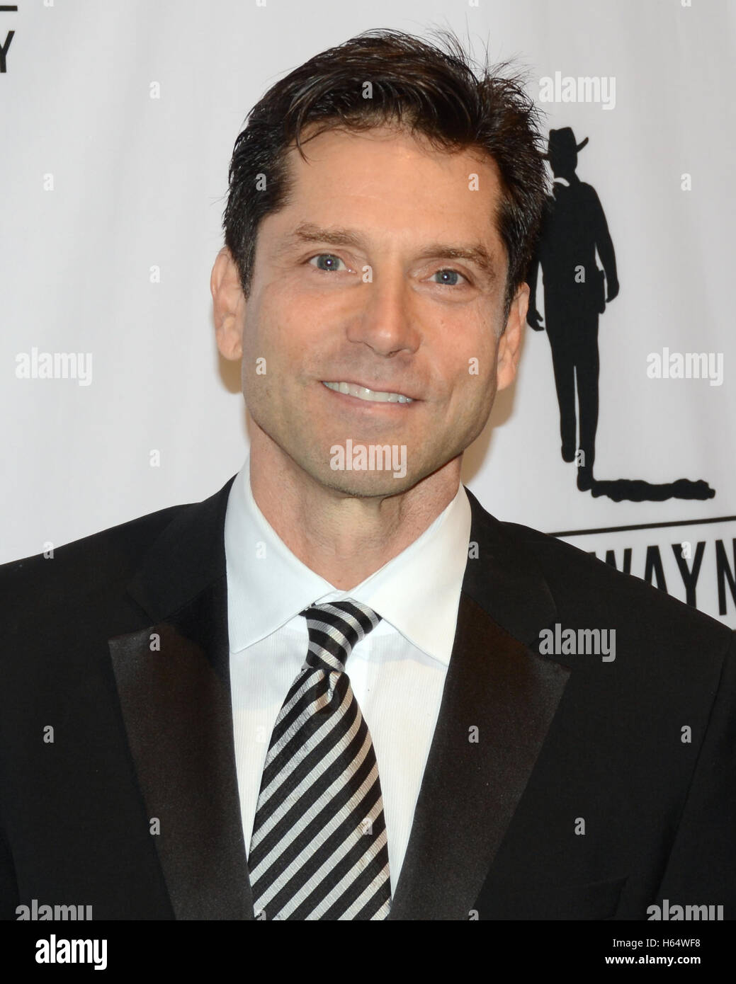 Gerard DiNome arrives at the 2015 John Wayne Cancer Institute Luncheon ...