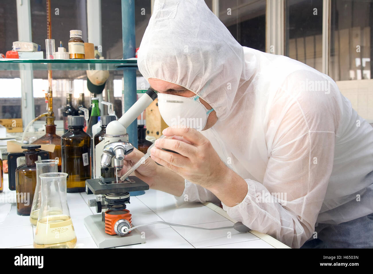 researcher at work in a laboratory Stock Photo - Alamy