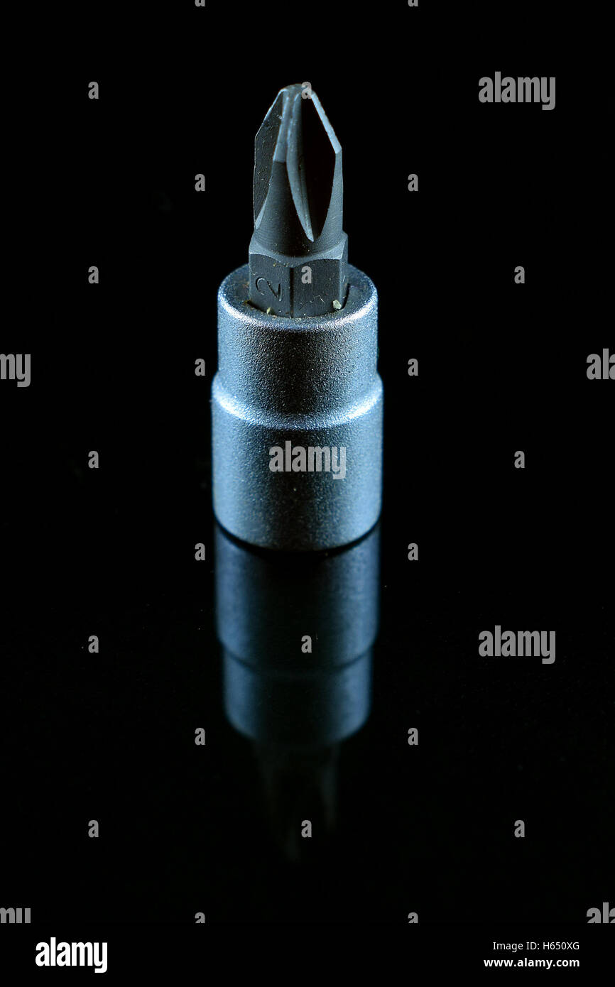 Single bit with black background and reflection Stock Photo - Alamy