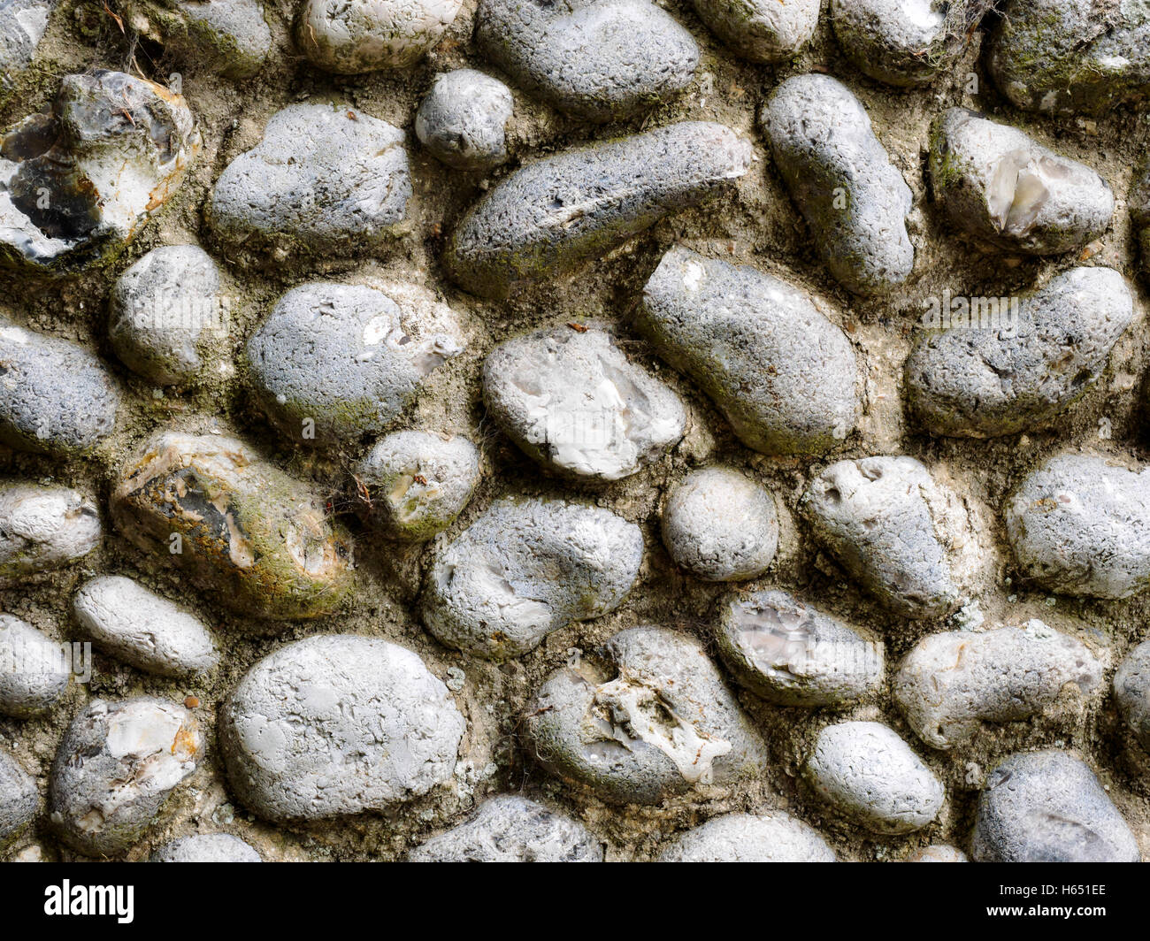 Traditional North Norfolk flint wall built using rounded cobbles ...