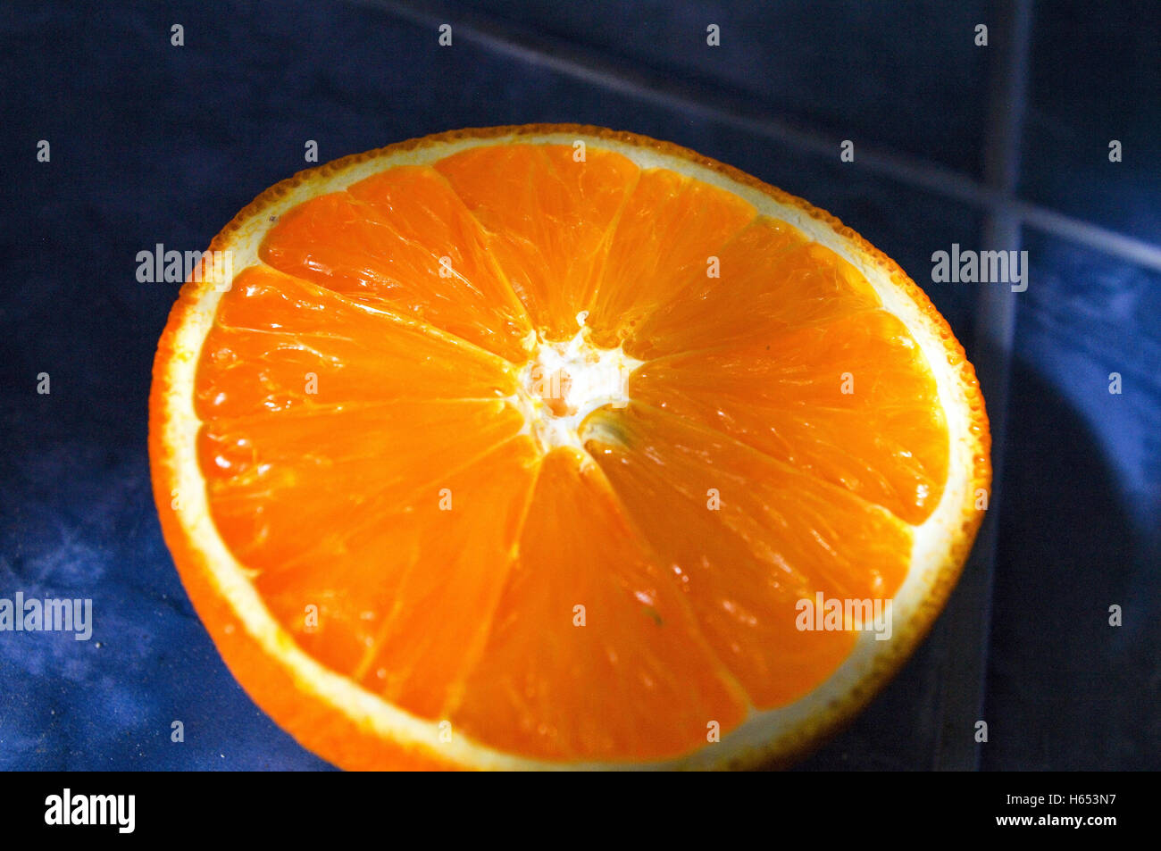 a fresh orange halve's side by side closeup, oranges cut in half Stock ...