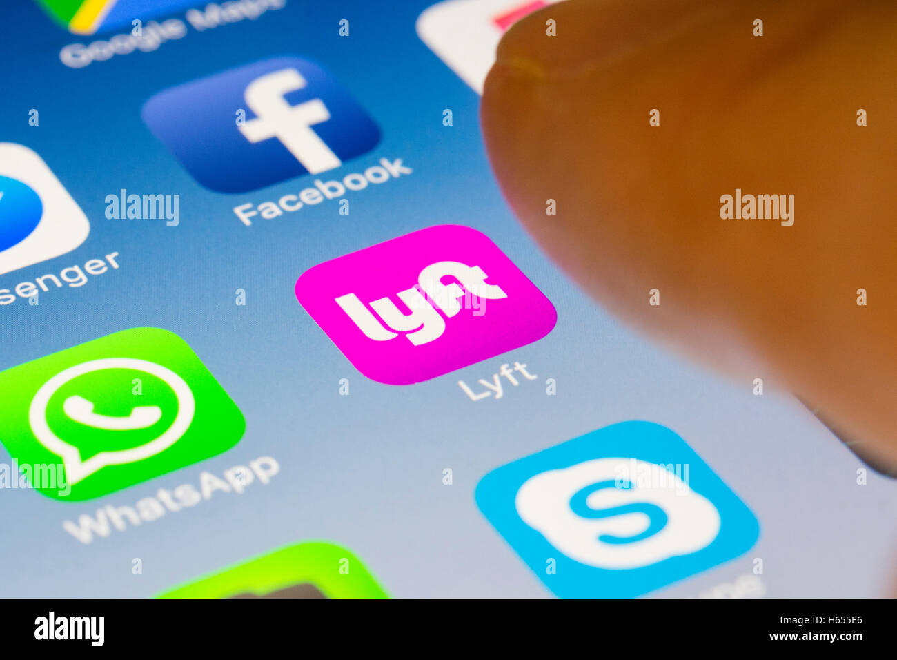 Lyft online mobile taxi booking app close up on iPhone smart phone ...