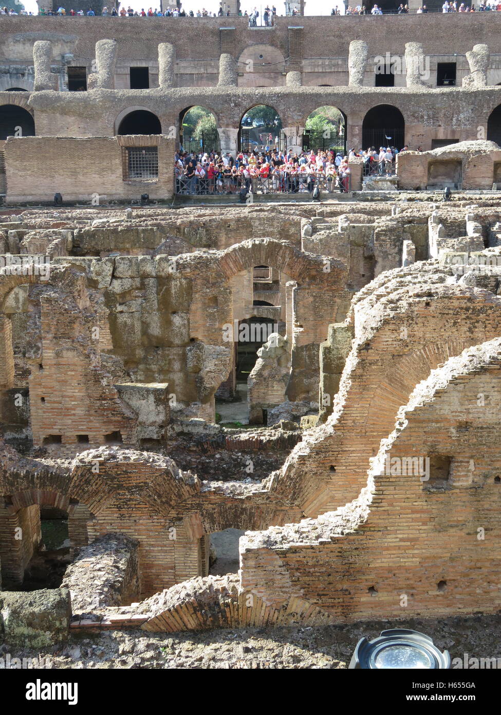 Tourists visiting the Colosseum Stock Photo - Alamy