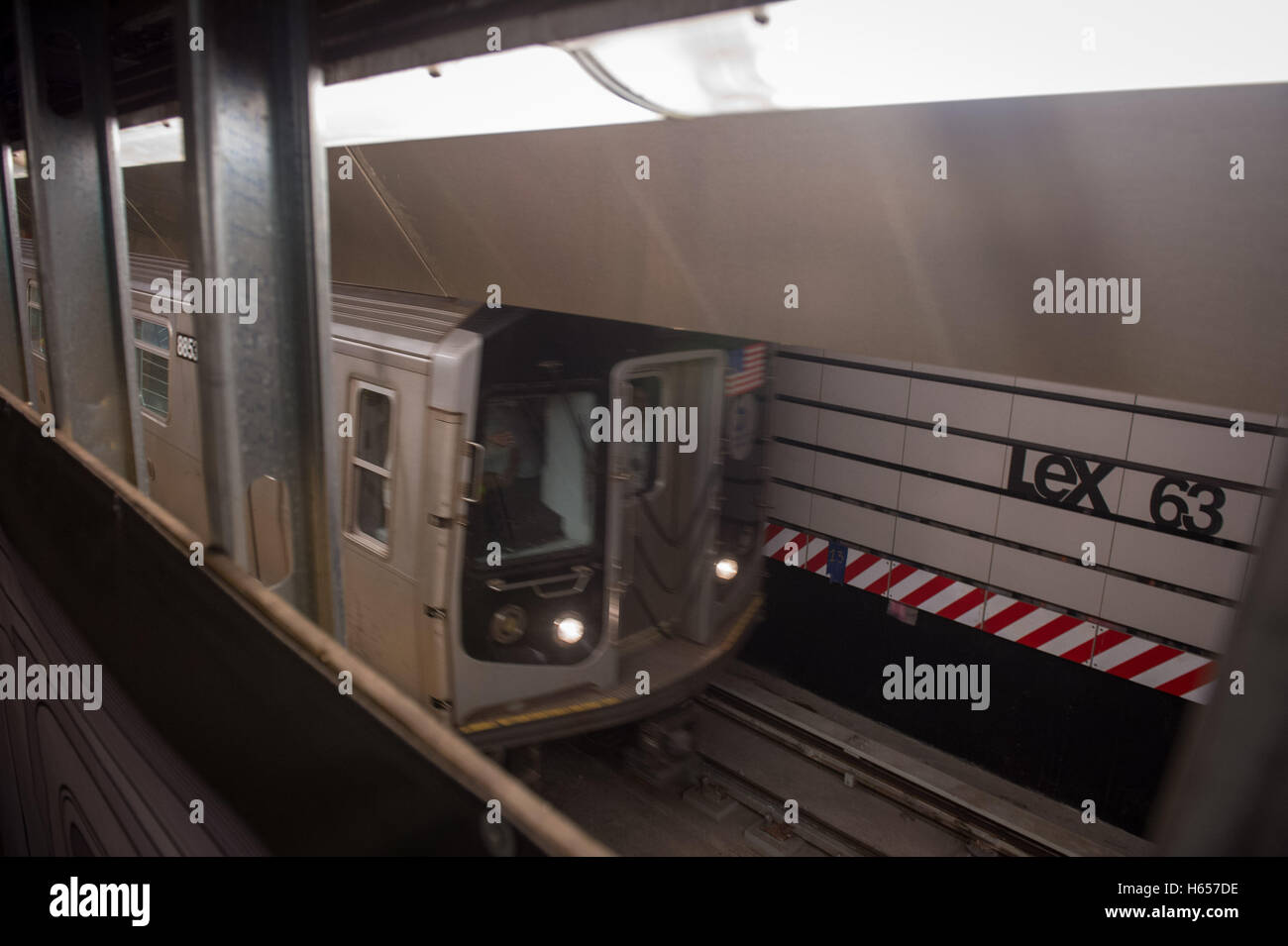 New York, NY, USA. 18th Oct, 2016. A test train moves on the new Q ...